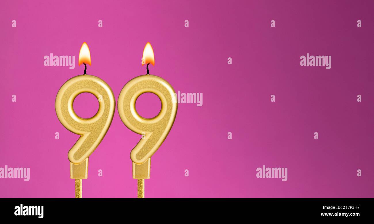 Candle number 99 in purple background - birthday card Stock Photo - Alamy