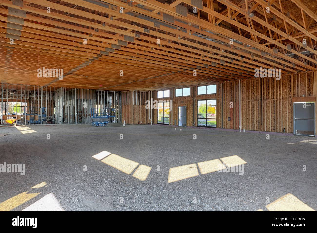 Wood and steel stud construction in the interior of a new strip mall ...