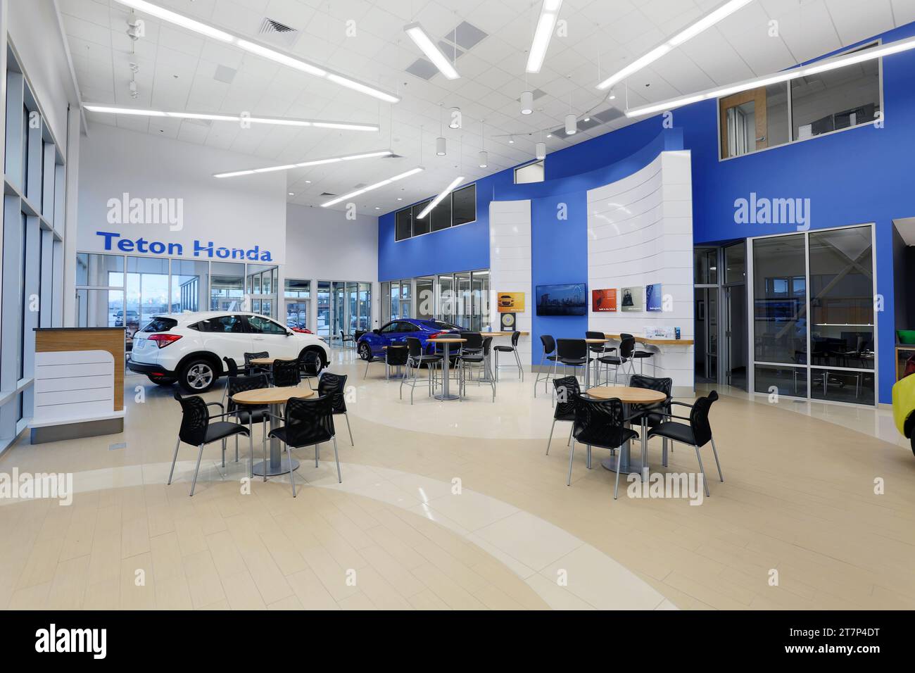 The customer show room with table chairs and comfortable furniture in a ...