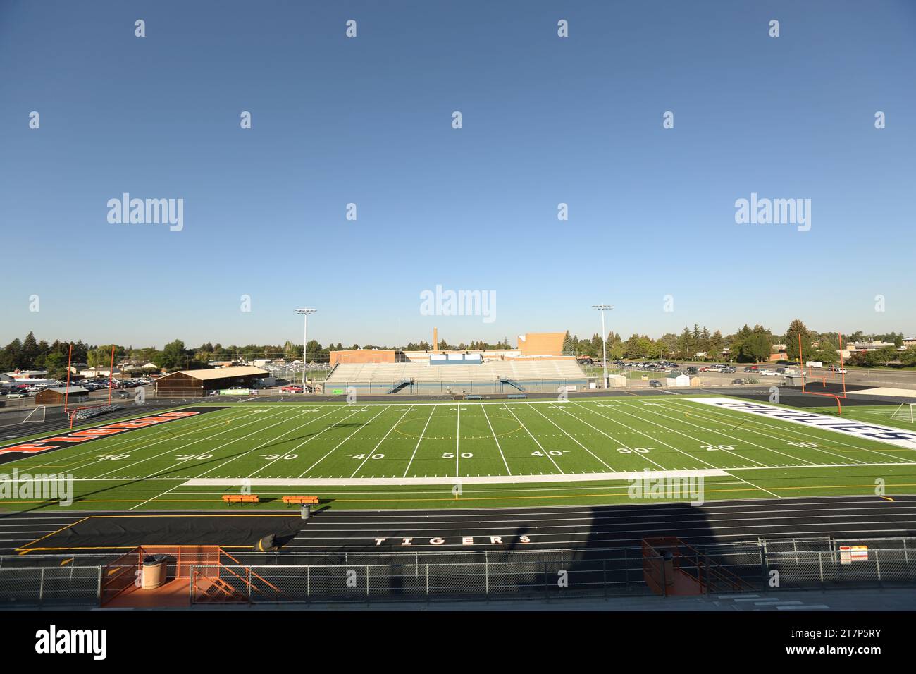 A newly renovated high school football field, with new artificial turf ...