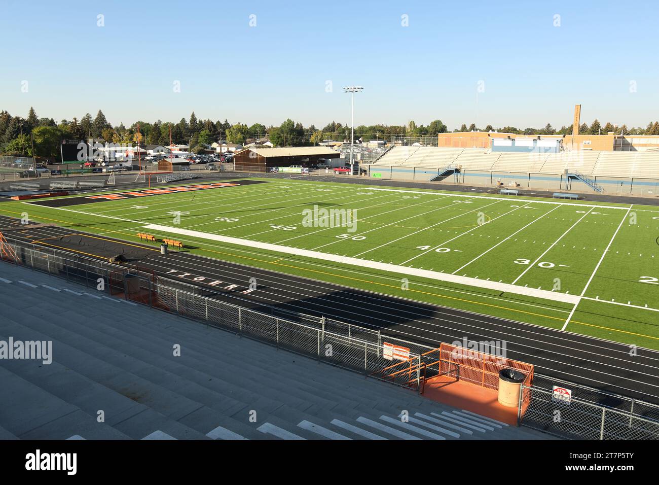 A newly renovated high school football field, with new artificial turf ...