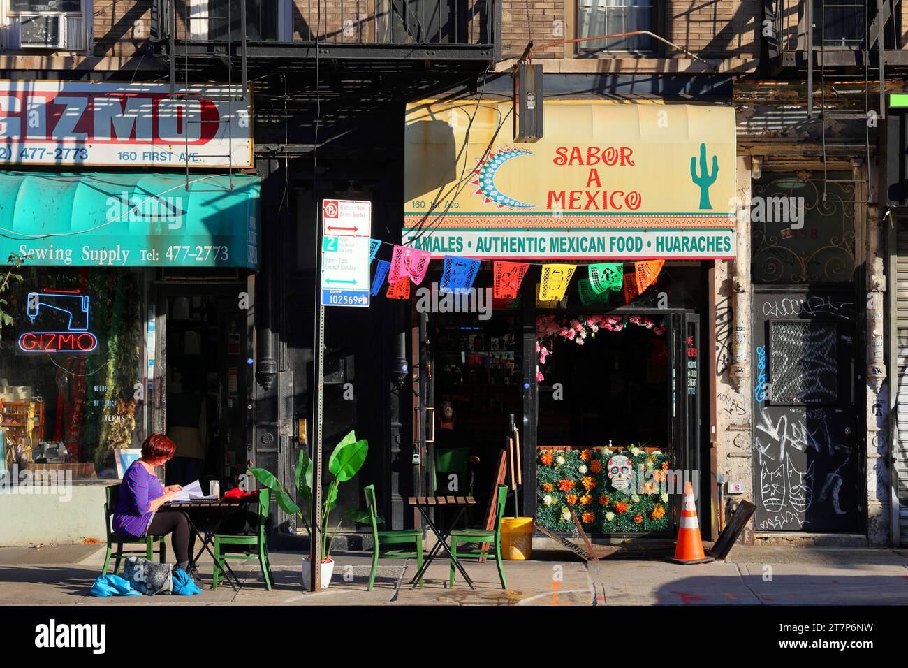 Alfresco sewing hi-res stock photography and images - Alamy