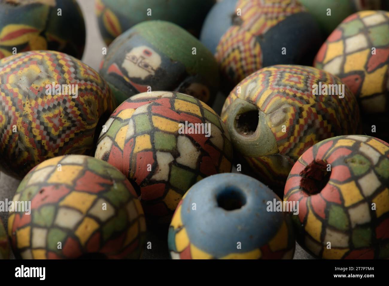 Ancient roman glass beads background Stock Photo - Alamy