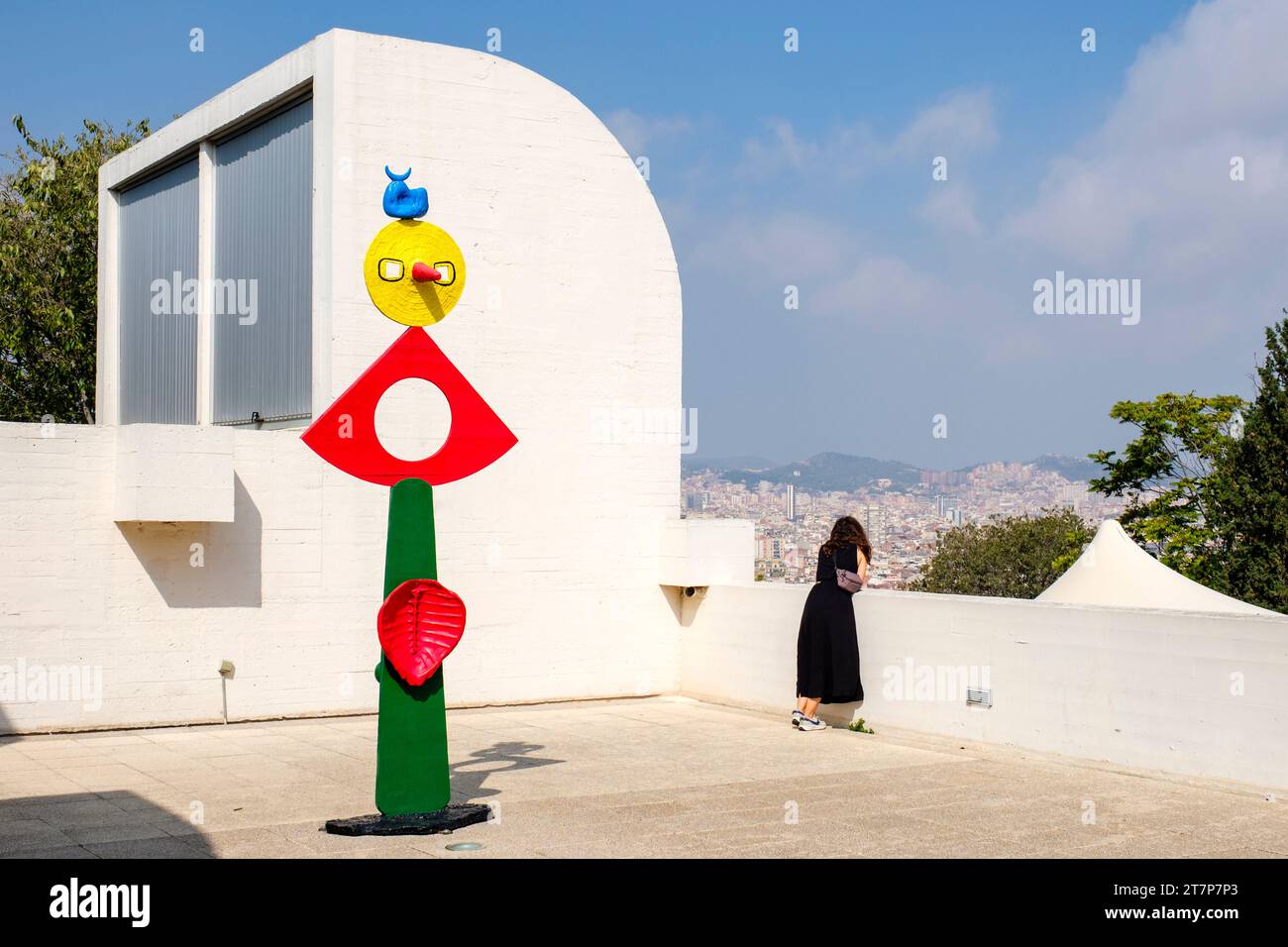 Visitor at art museum, Joan Miró sculpture The Caress of a Bird ...