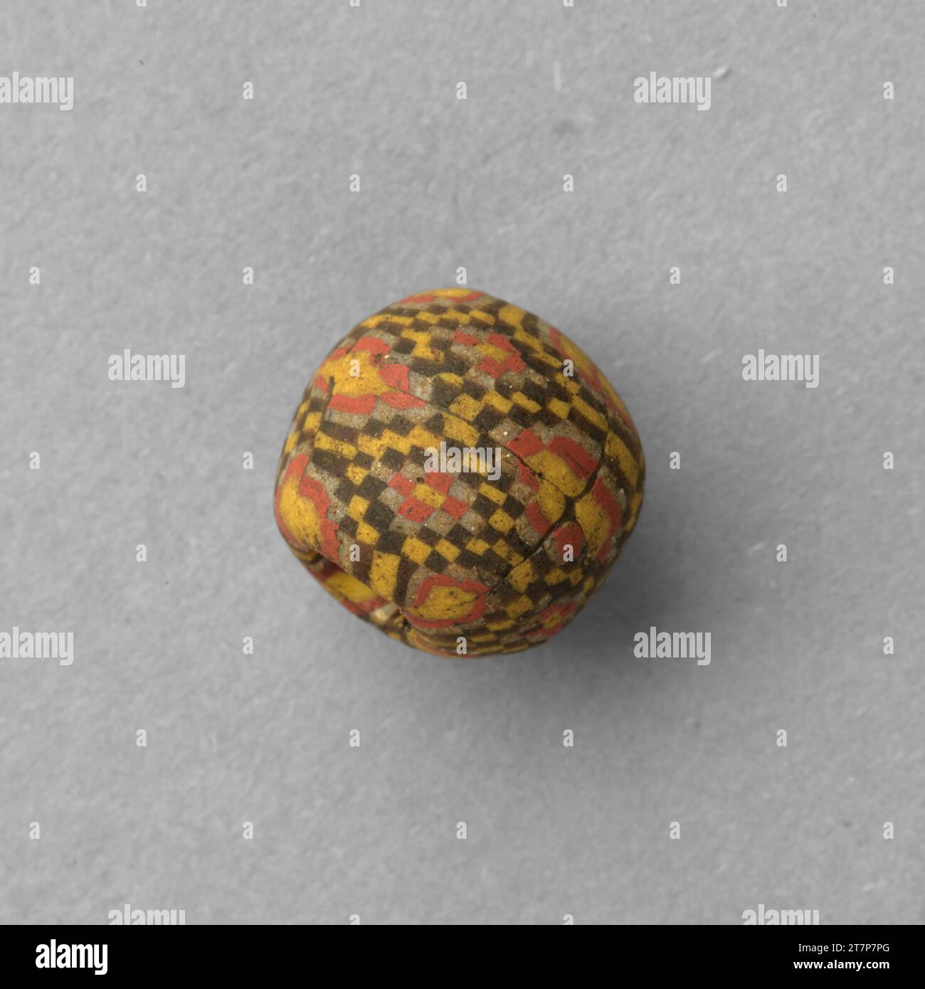 Ancient roman glass mosaic bead Stock Photo - Alamy