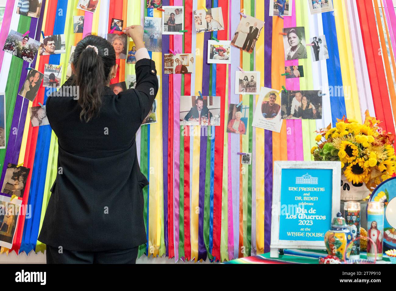 October 31, 2023 - Washington, D.C., USA - People place a photo of a ...
