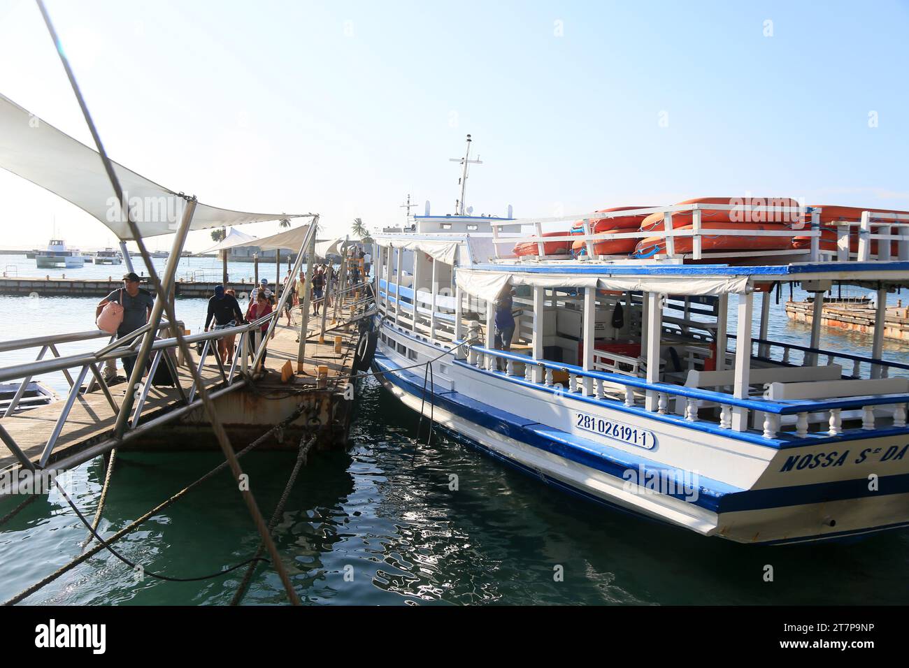 vera cruz, bahia, brazil - october 13, 2023: passengers using a boat to ...
