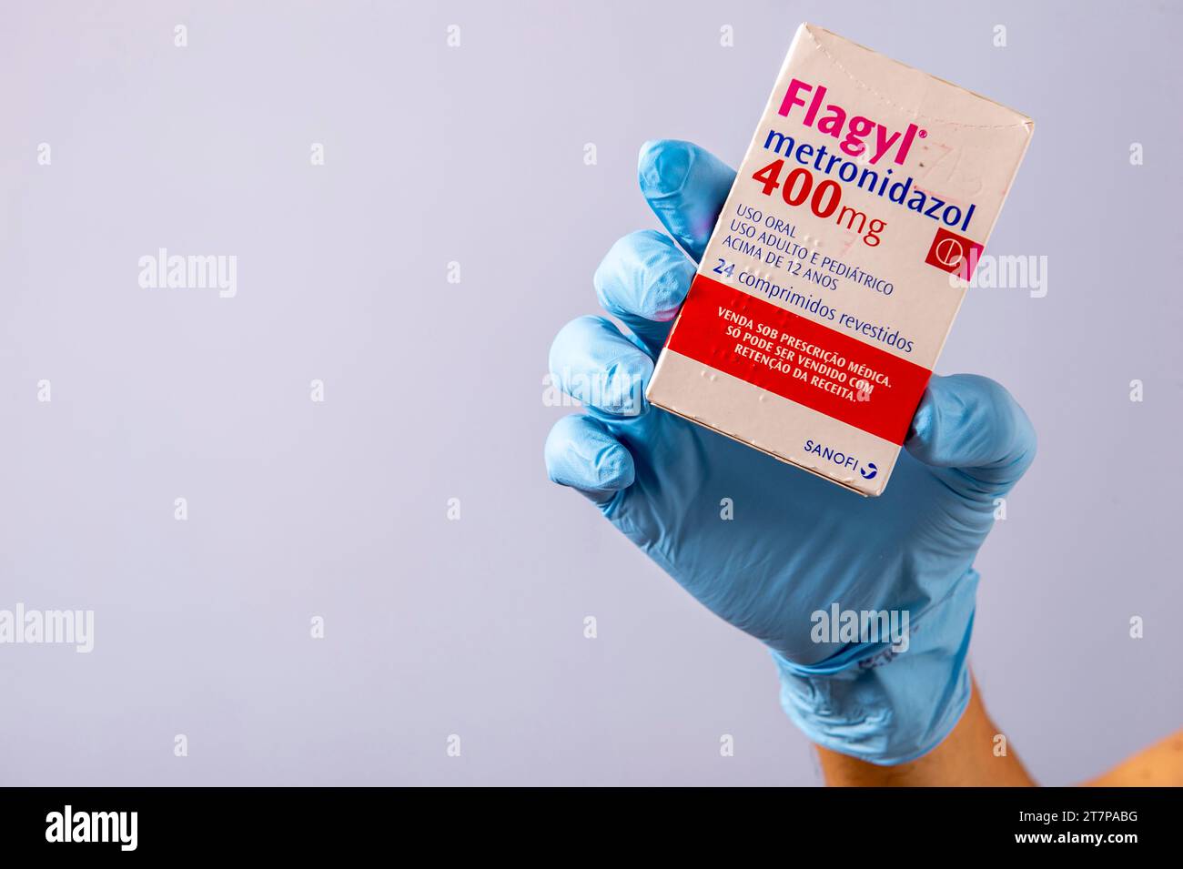 Rio, Brazil - January 27, 2023, hand with protective rubber glove ...