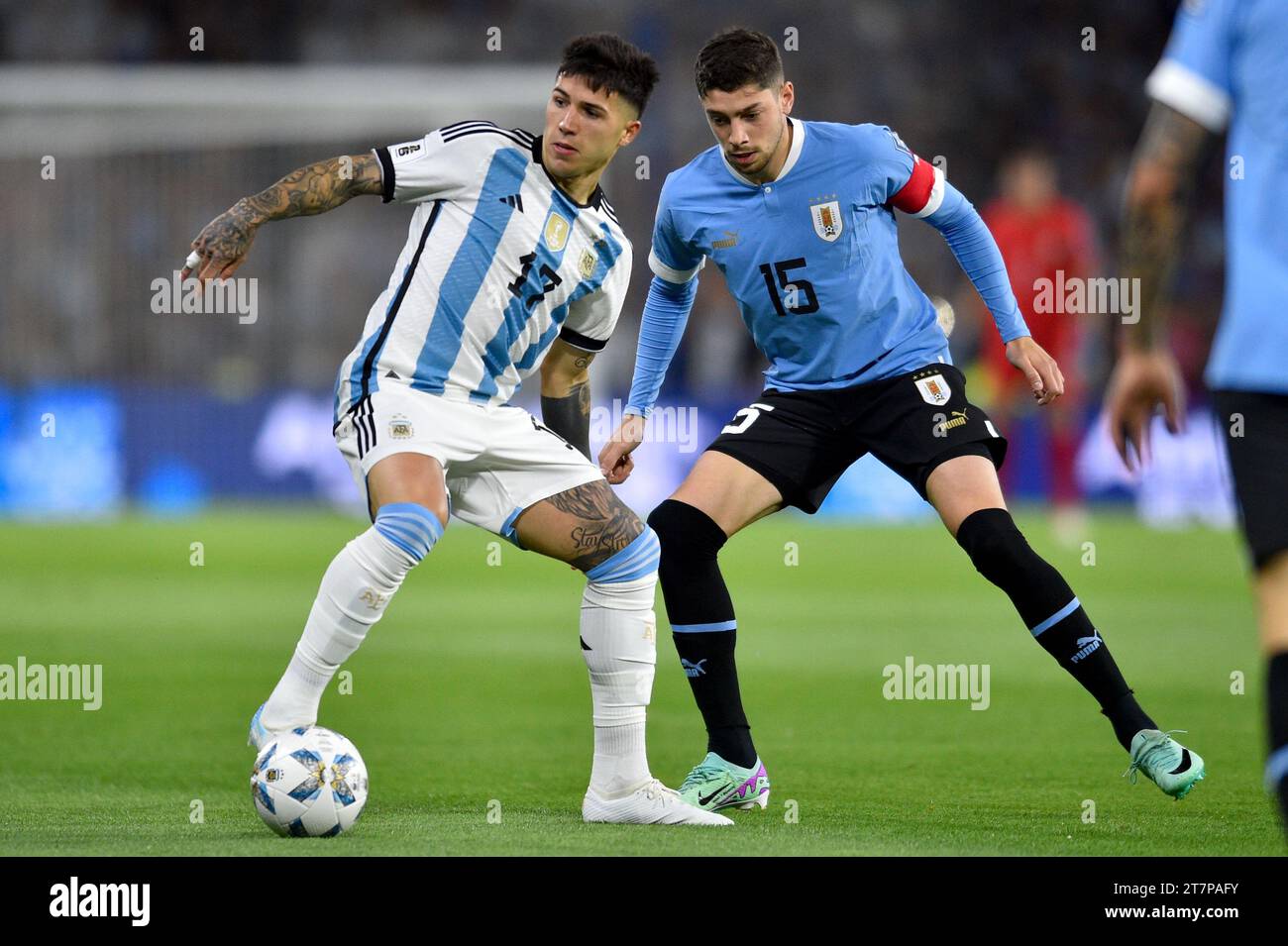 Argentina's Enzo Fernandez, left, and Uruguay's Federico Valverde ...