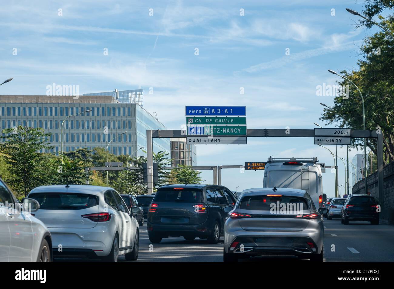 Driving in heavy traffic on ring road of capital of France, traffic jam ...