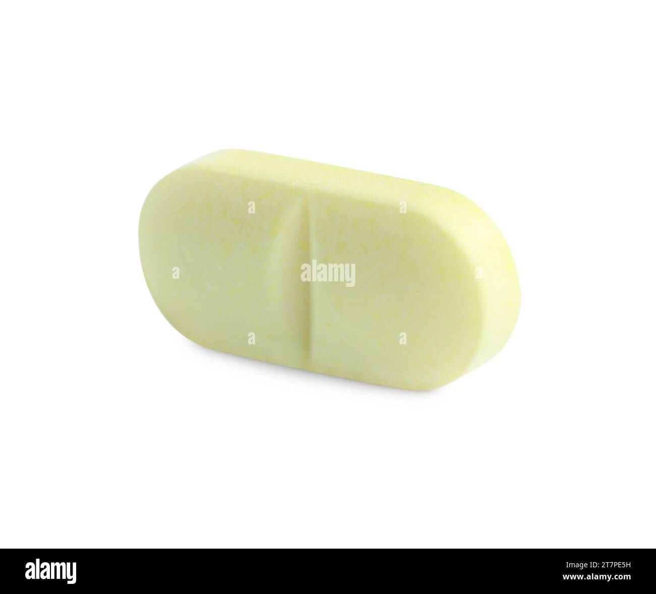 One yellow pill isolated on white. Medicinal treatment Stock Photo - Alamy