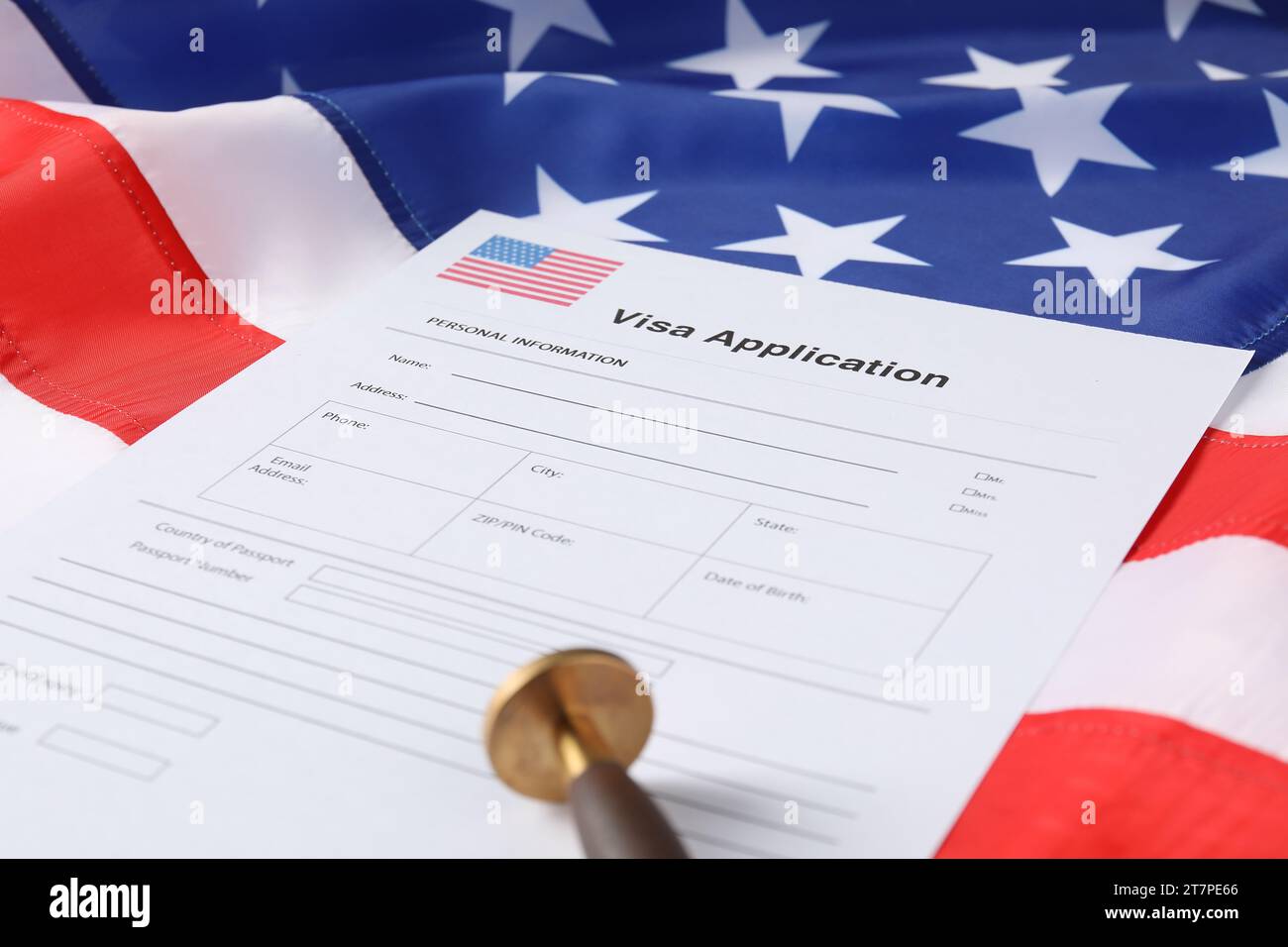 Immigration to USA. Visa application form and stamp on flag, closeup ...