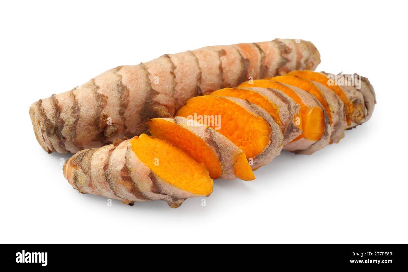Whole and cut turmeric roots isolated on white Stock Photo - Alamy