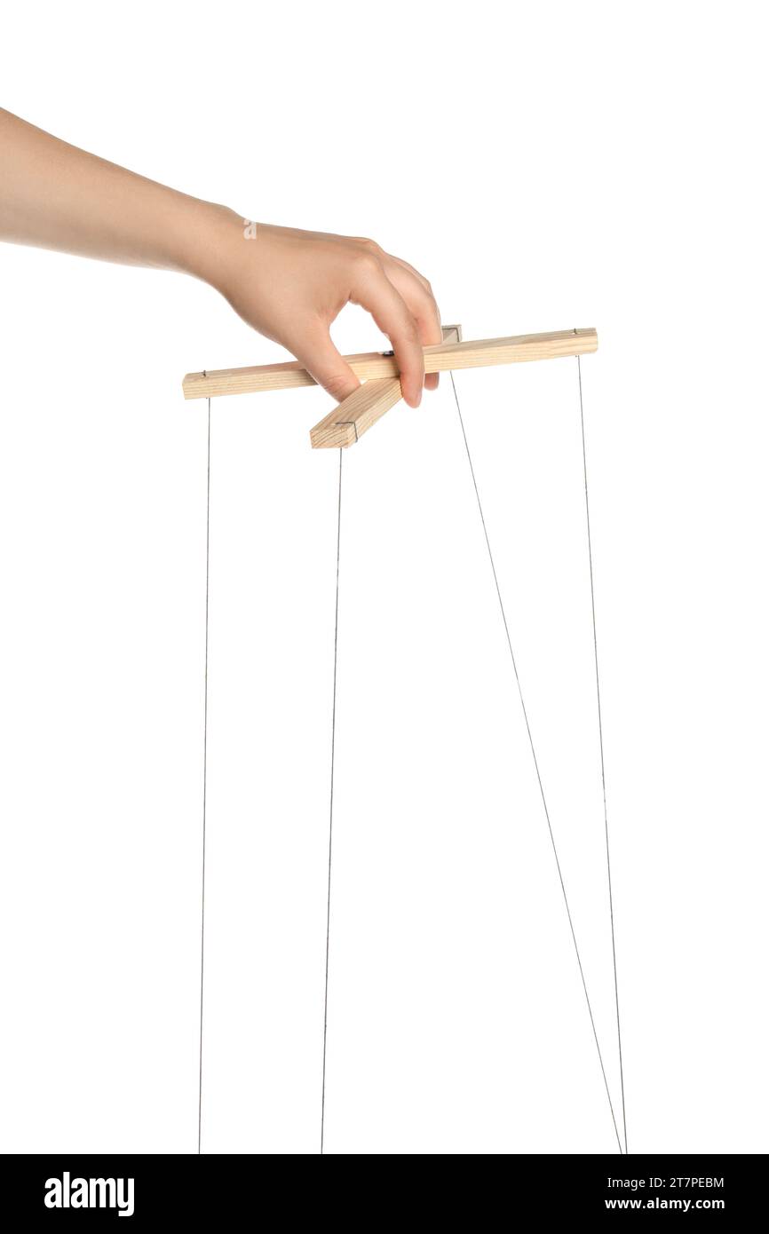Woman pulling strings of puppet on white background, closeup Stock ...
