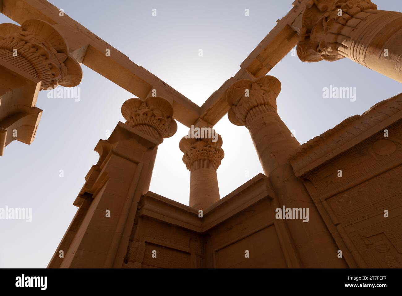 Hieroglyphic covered columns reaching into the blue sky of at the ...