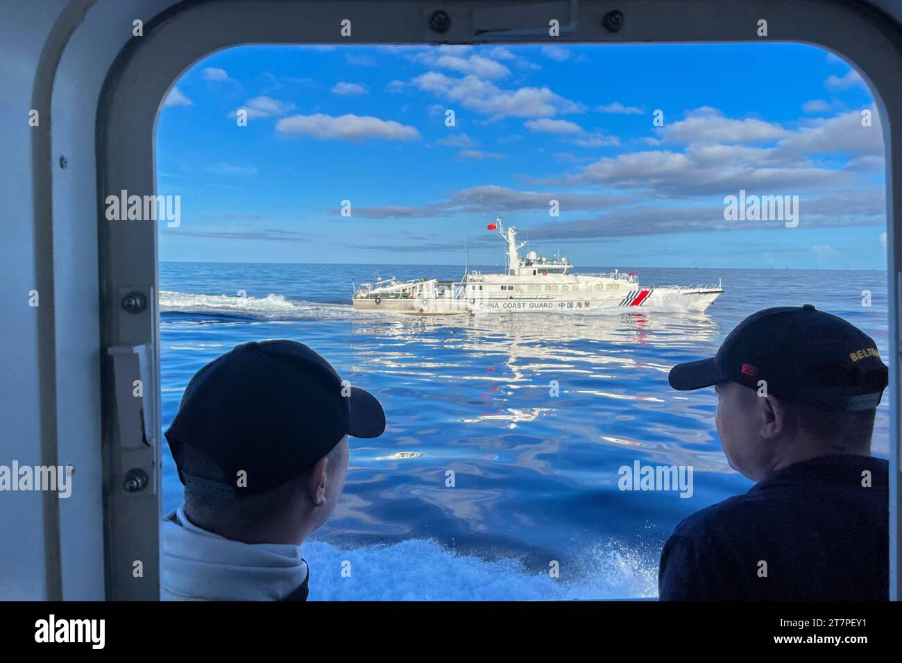 A Chinese coast guard vessel maneuvers beside the Philippine coast ...