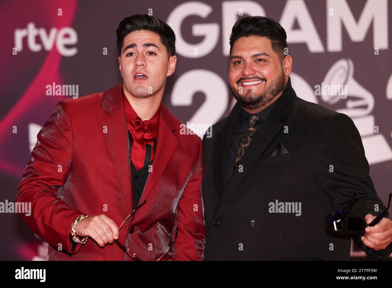 Jerry Corrales, left, and Issac Salas of La Adictiva arrive at the 24th ...