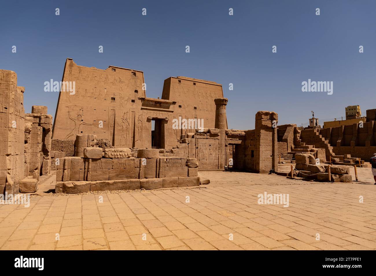 Ruins of the giant temple walls and columns of the ancient Edfu temple ...
