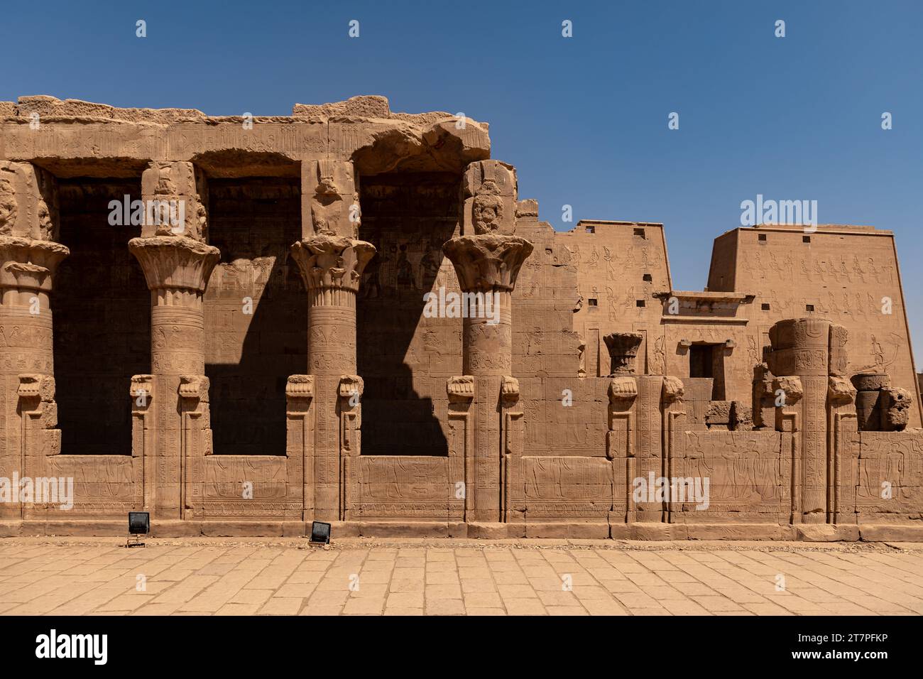 Ruins of the giant temple walls and columns of the ancient Edfu temple ...