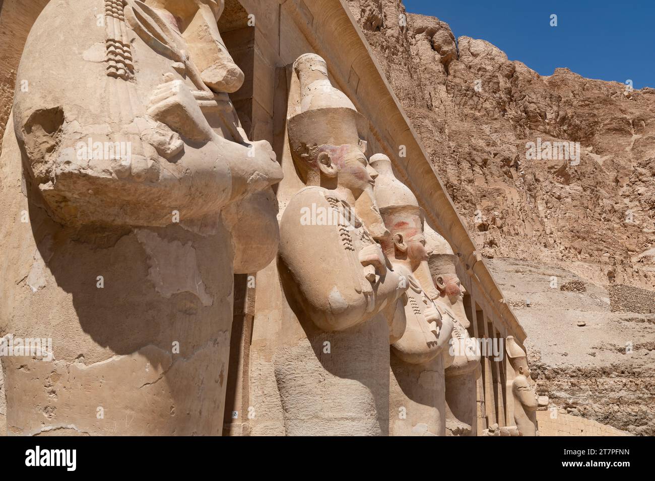 Large stone statues crumbling outside in the ancient Valley of the ...