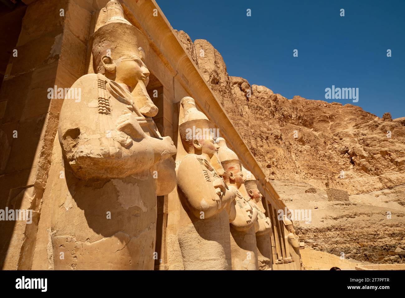 Large stone statues crumbling outside in the ancient Valley of the ...