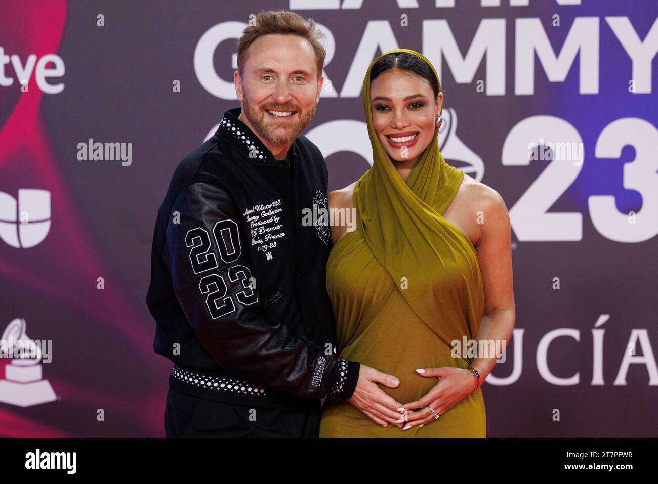 David Guetta, left, and Jessica Ledon arrive at the 24th annual Latin ...