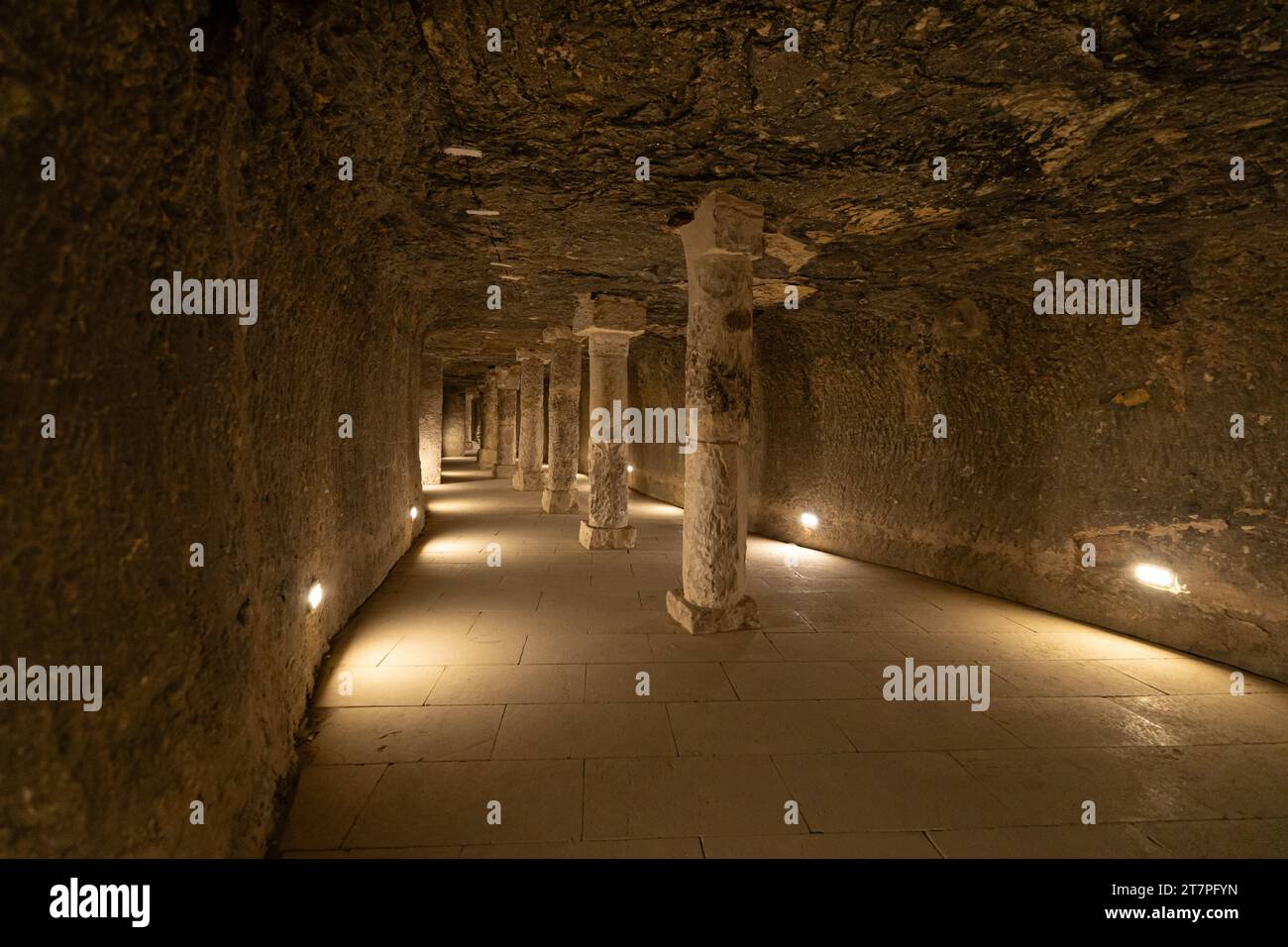 Ancient Saqqara tomb's subterranean paths with columns and hieroglyphics in the underground ...