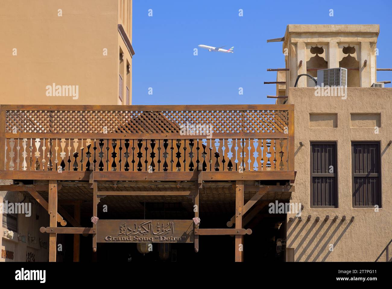 An Emirates Boeing 777 jet taking off over the popular Grand Souk in ...