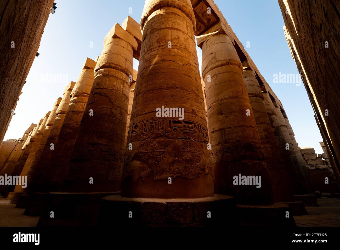 Giant stone columns engraved with hieroglyphics inside the ancient ...