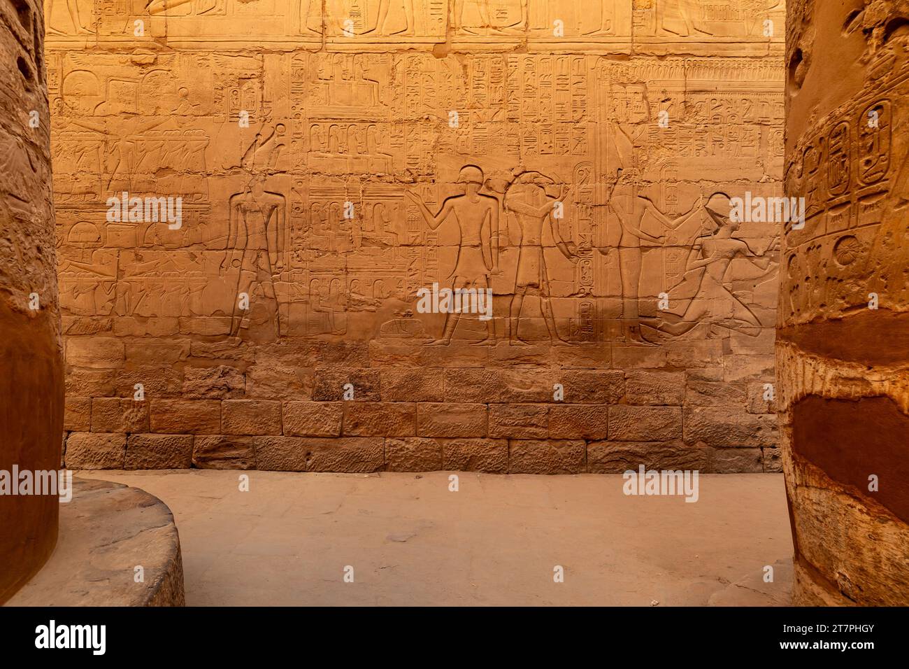 Hieroglyphic reliefs on the walls and columns of the ancient ruins of ...