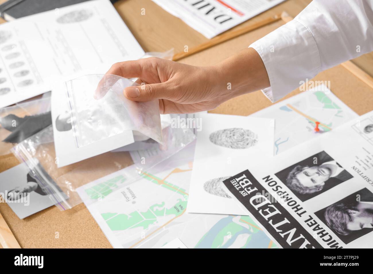 Female FBI agent investigating case in office, closeup Stock Photo - Alamy