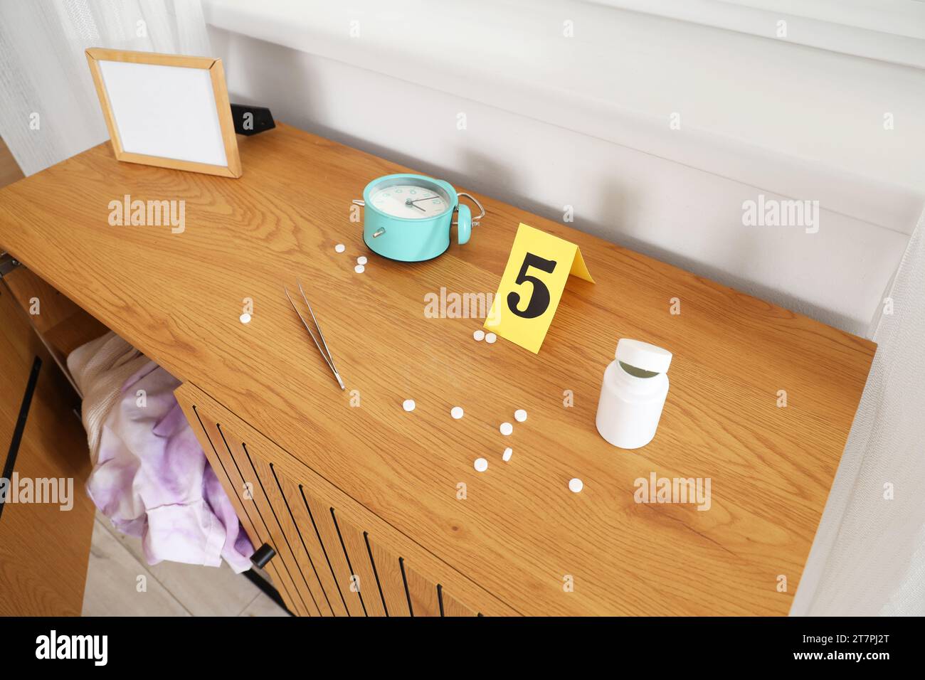 Evidence on chest of drawers at crime scene Stock Photo - Alamy