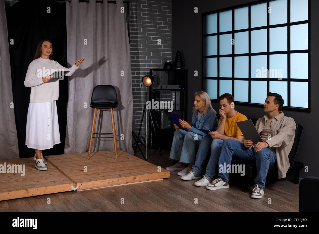 Actors casting on stage in audition room Stock Photo - Alamy