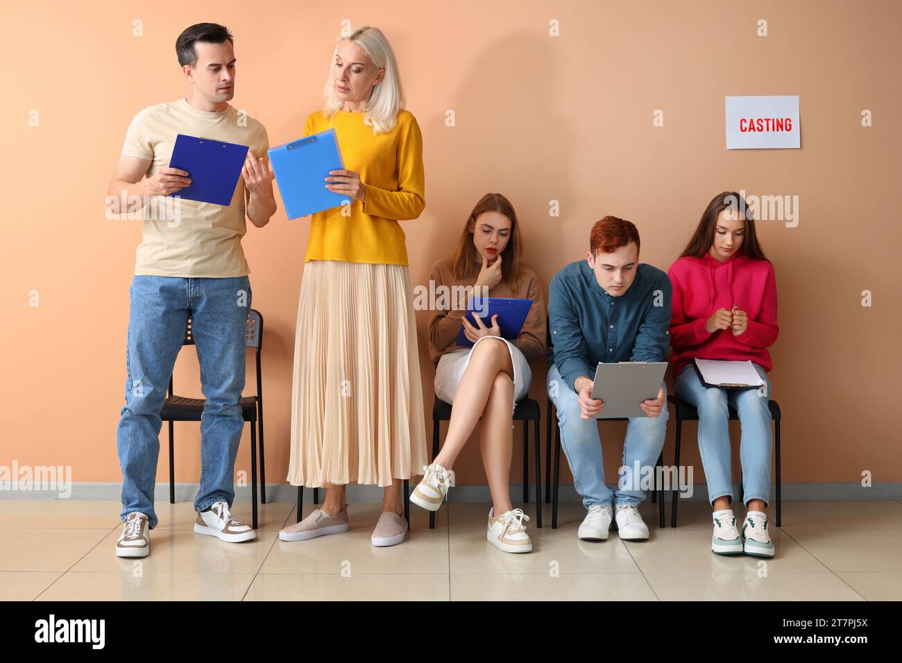 Actors waiting for casting in hall Stock Photo - Alamy