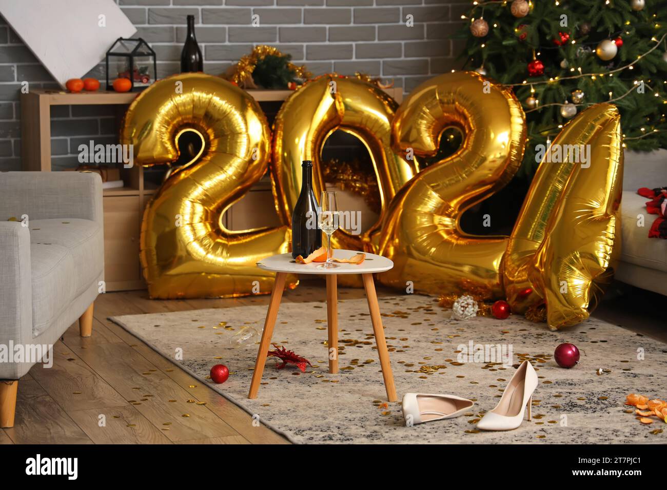 Interior of messy living room after New Year party with figure 2024 ...