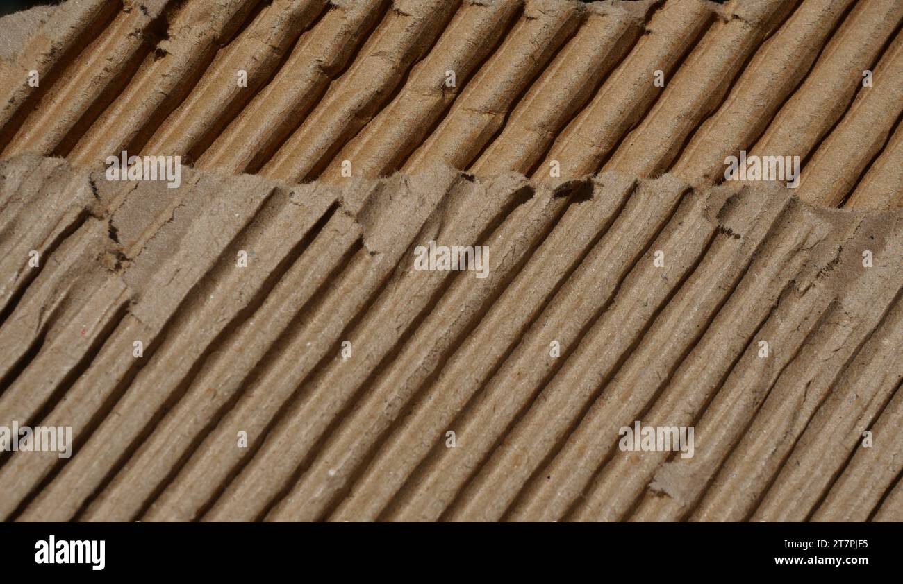 Torn brown cardboard background, Ripped craft paper or carton with ...