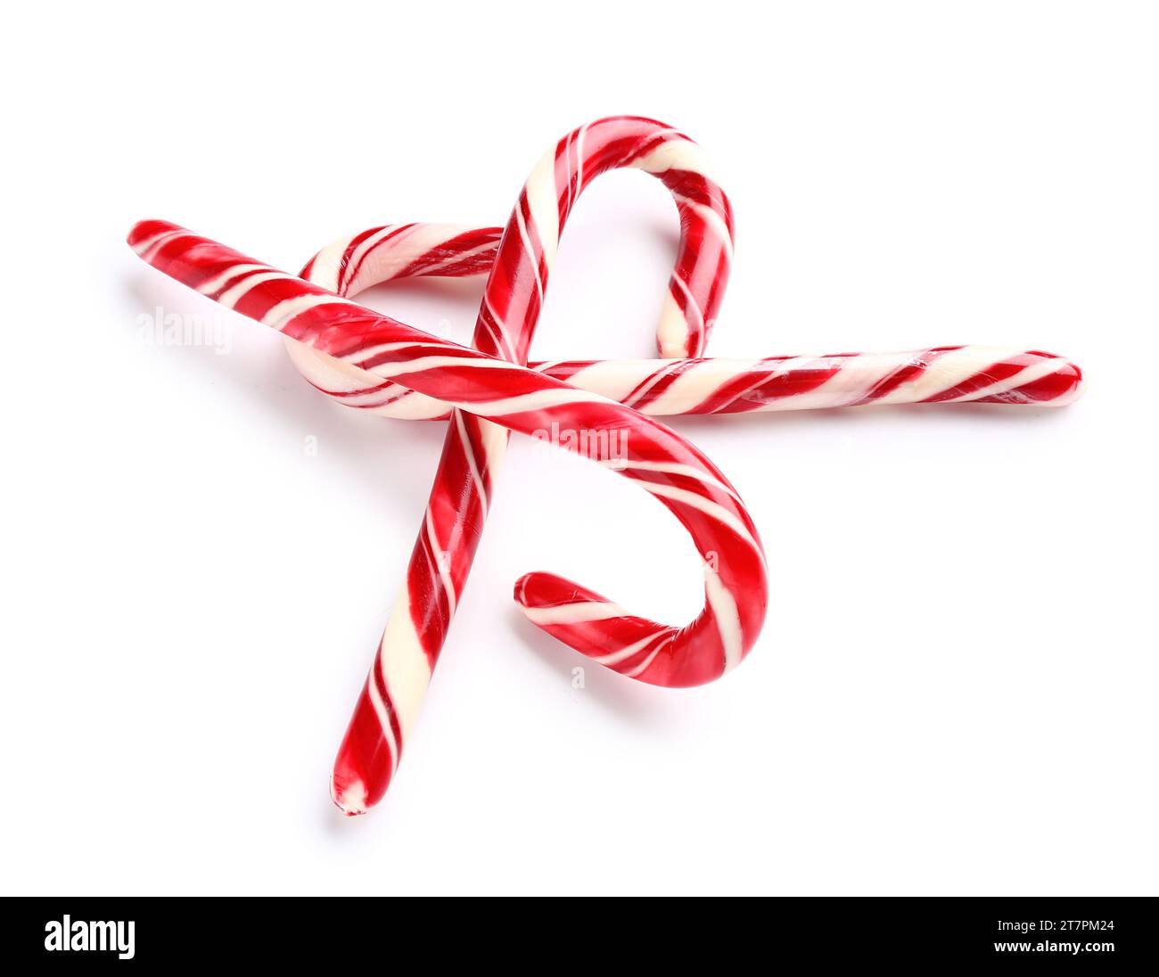 Sweet Christmas candy canes on white background Stock Photo - Alamy