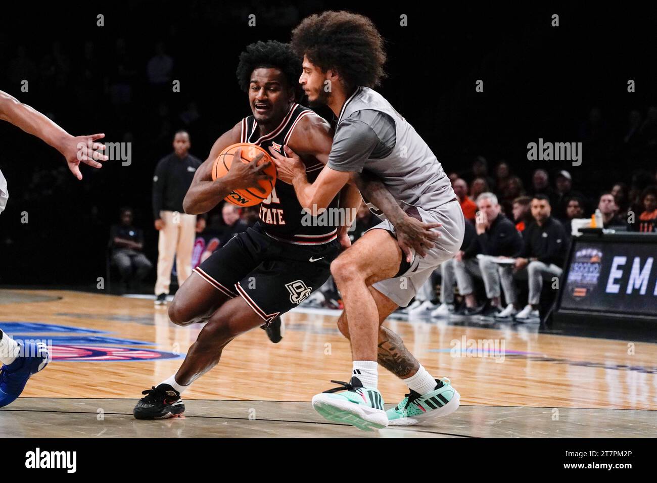 Oklahoma State guard John-Michael Wright drives to the basket against ...