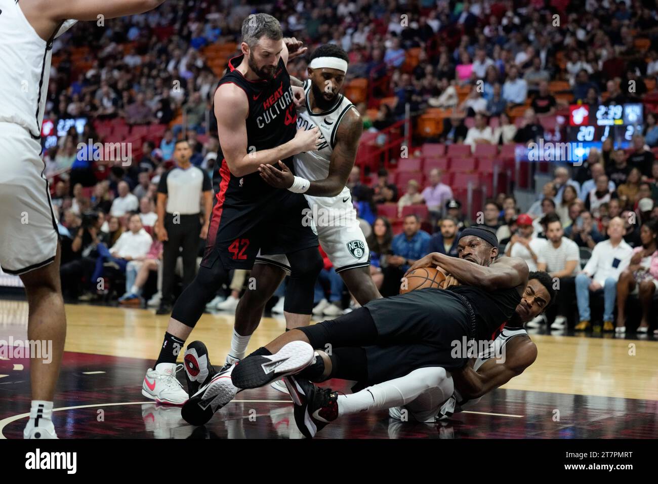 Brooklyn Nets center Nic Claxton (33), bottom right, and Miami Heat ...
