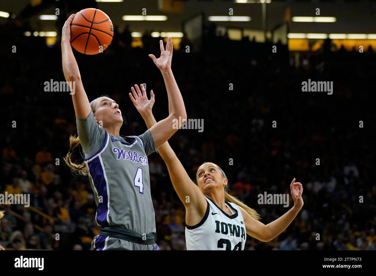 Kansas State guard Serena Sundell (4) shoots over Iowa guard Gabbie ...