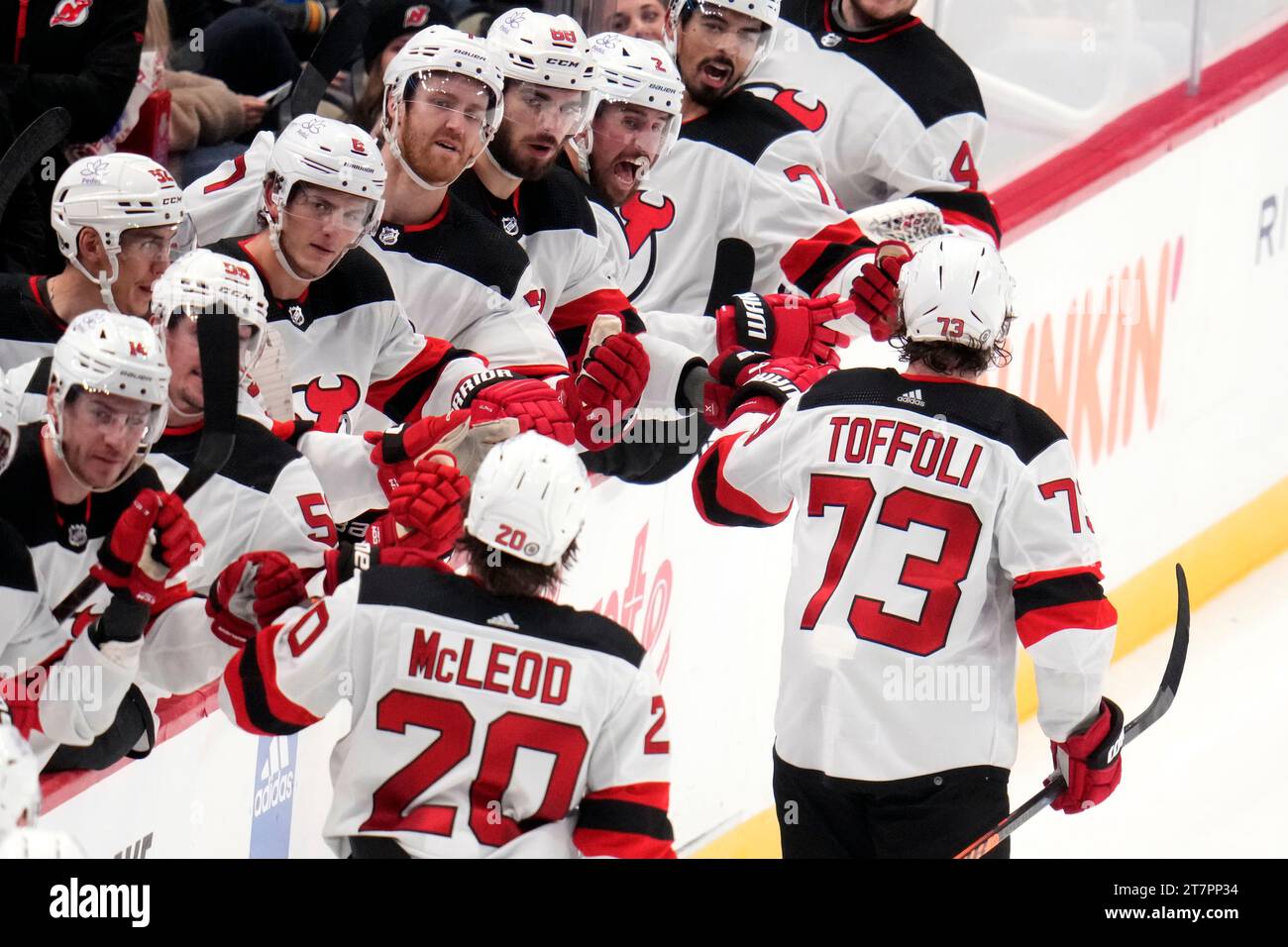 New Jersey Devils' Tyler Toffoli (73) returns to the bench after ...