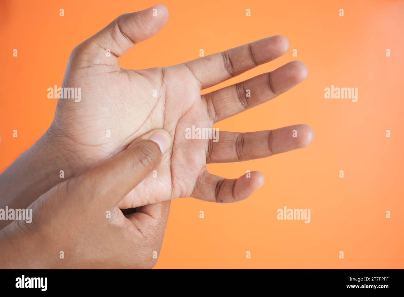 man suffering pain in hand close up Stock Photo - Alamy