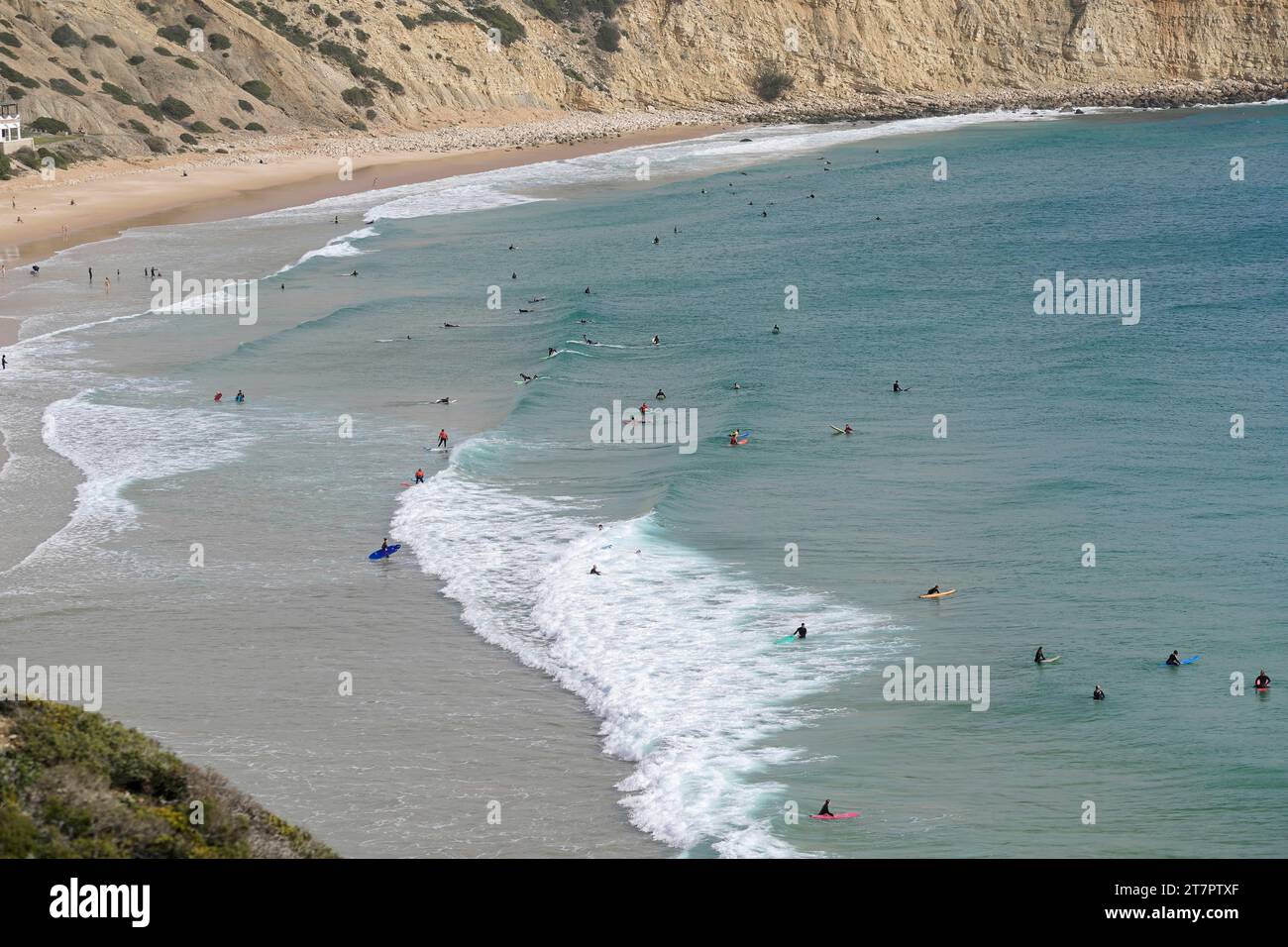 Surfers in the surf at Sagres beach, Faro district, Algarve, Portugal ...