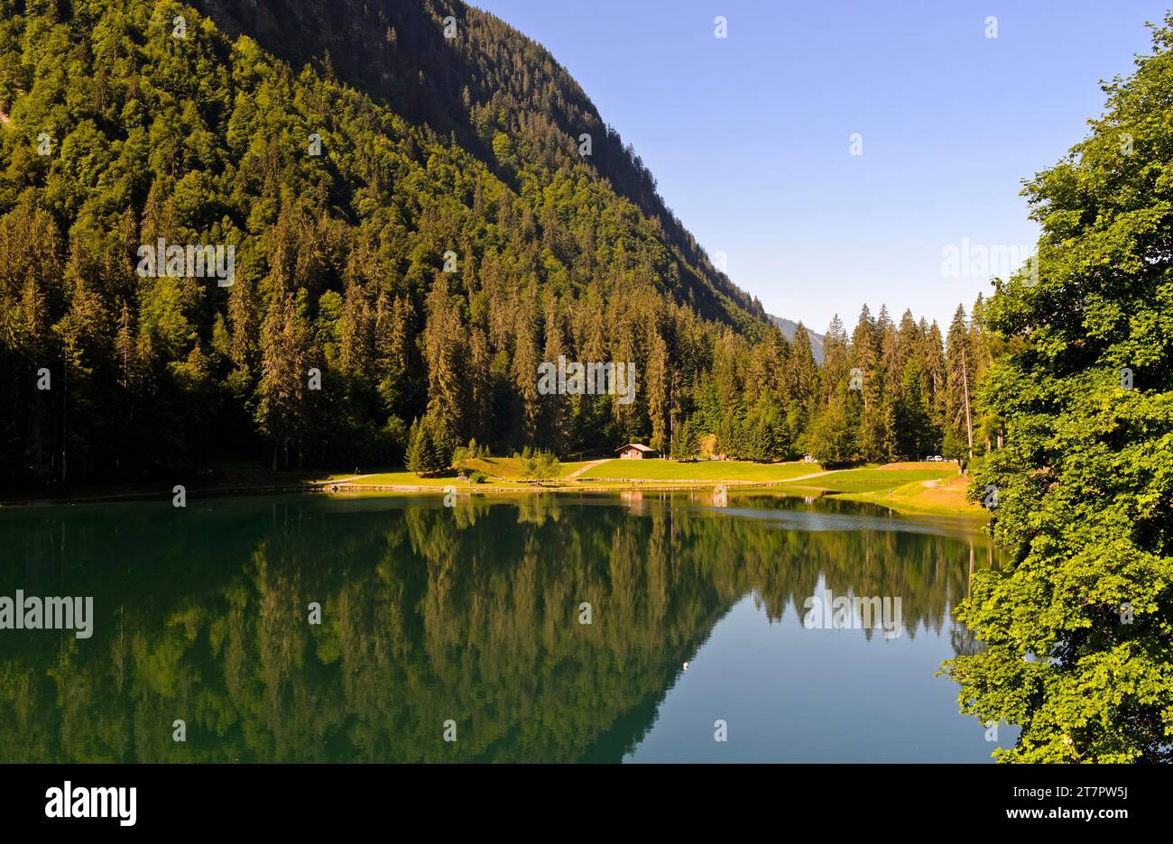 Montriond mountain lake, Lac de Montriond, in the Chablais Geopark ...