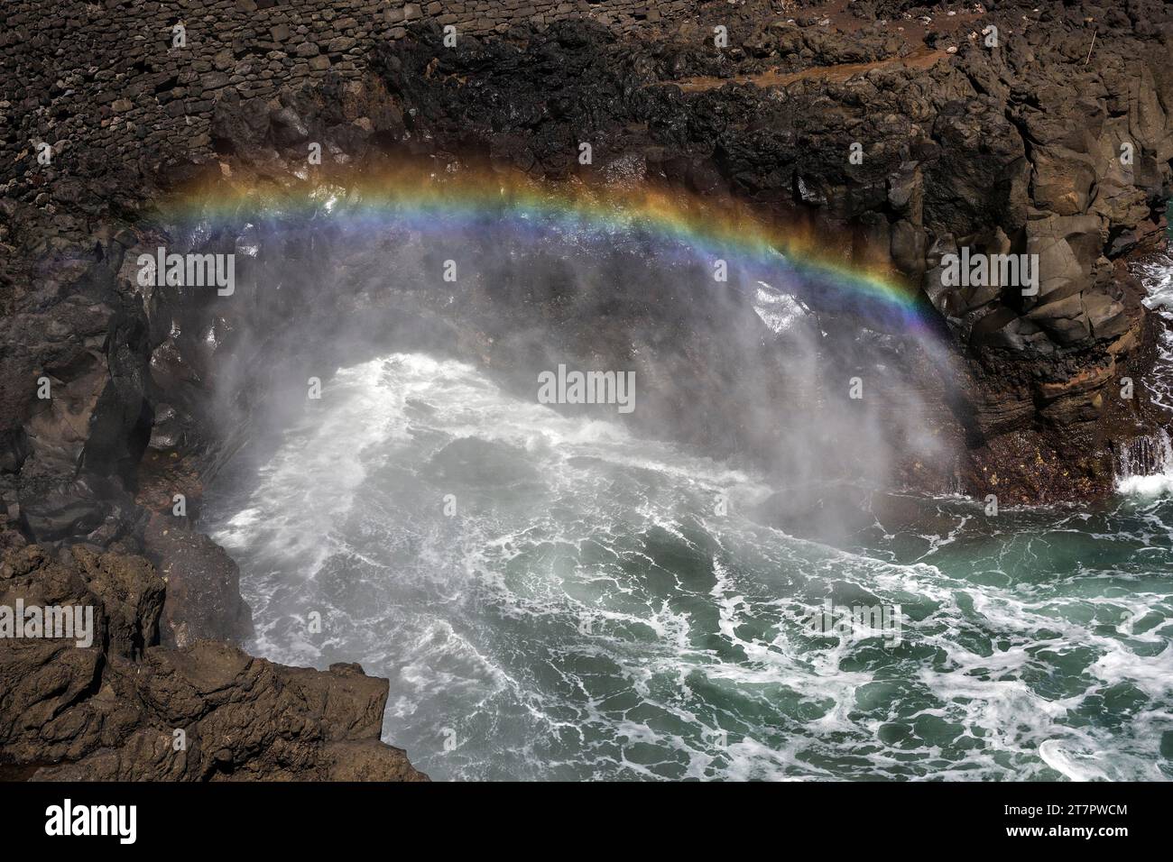 Whale's Cave, spray with rainbow, at Miradouro Furna do Porto da Cruz ...