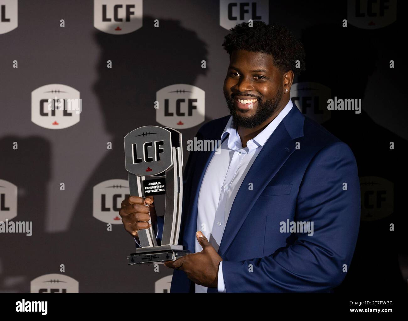 Toronto Argonauts' Dejon Allen poses with his award for the Most ...