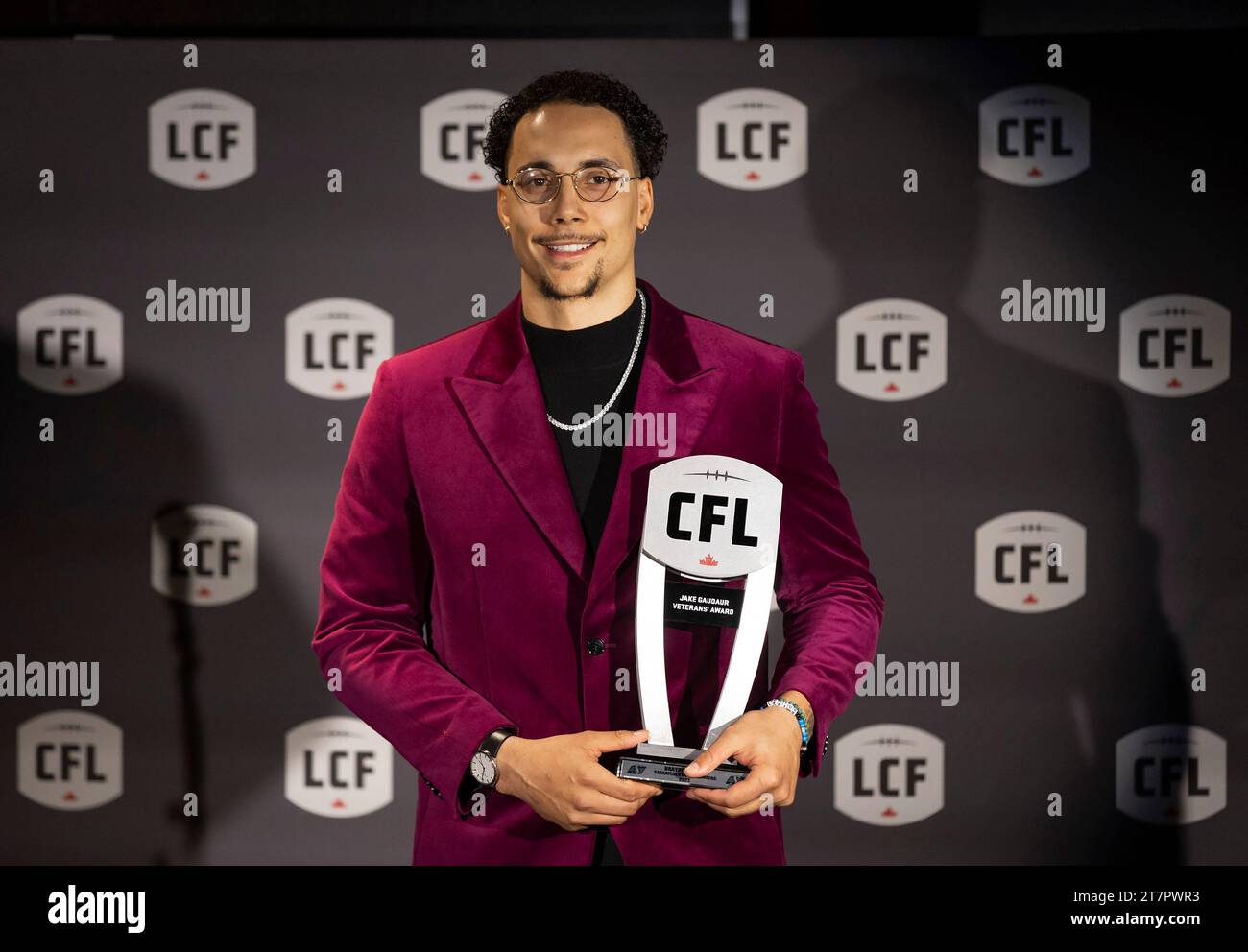 Saskatchewan Roughriders' Brayden Lenius poses with the Jake Gaudaur ...