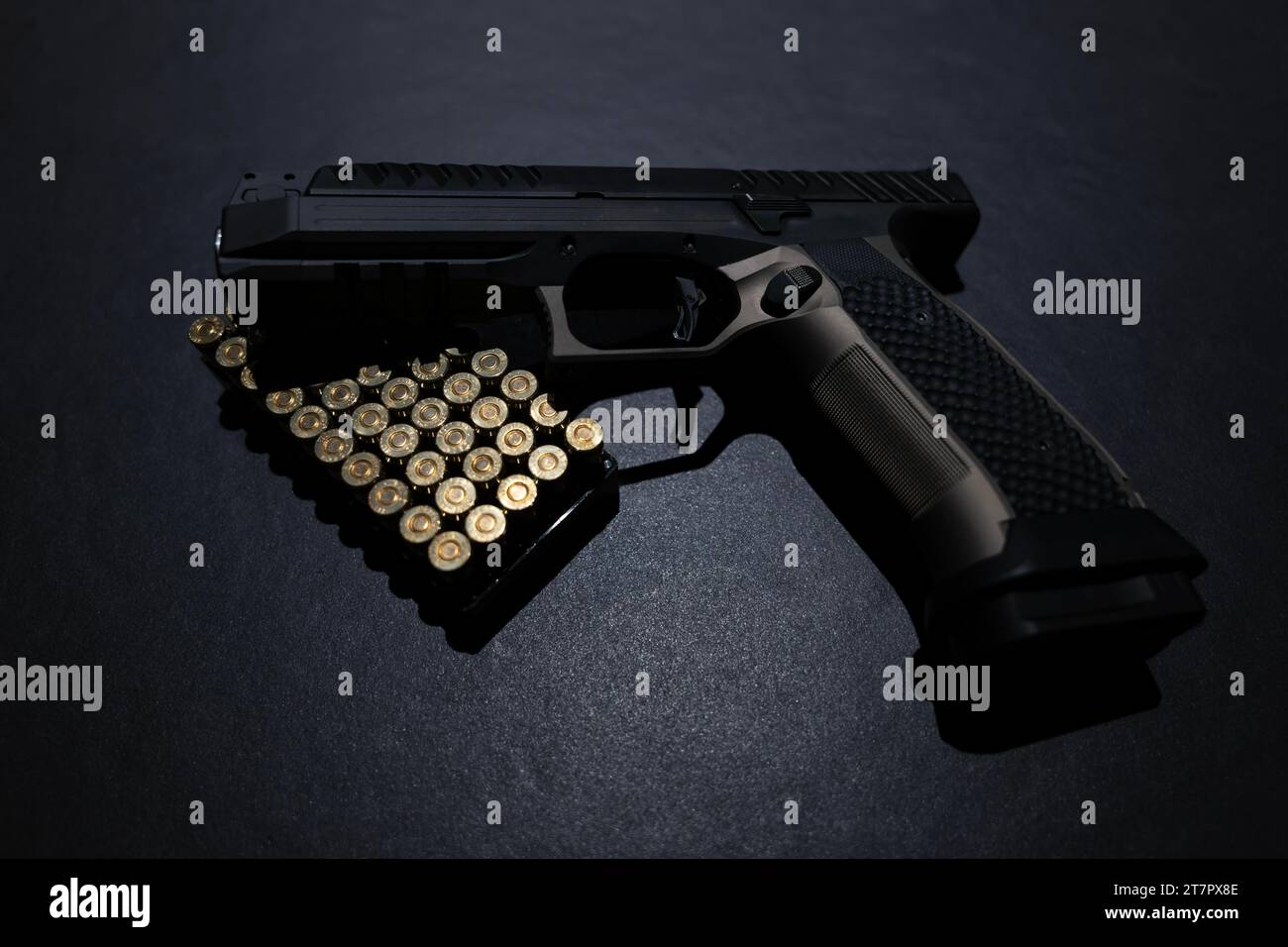 Modern Elegant Handgun and Bullet on Grey Background in Switzerland ...