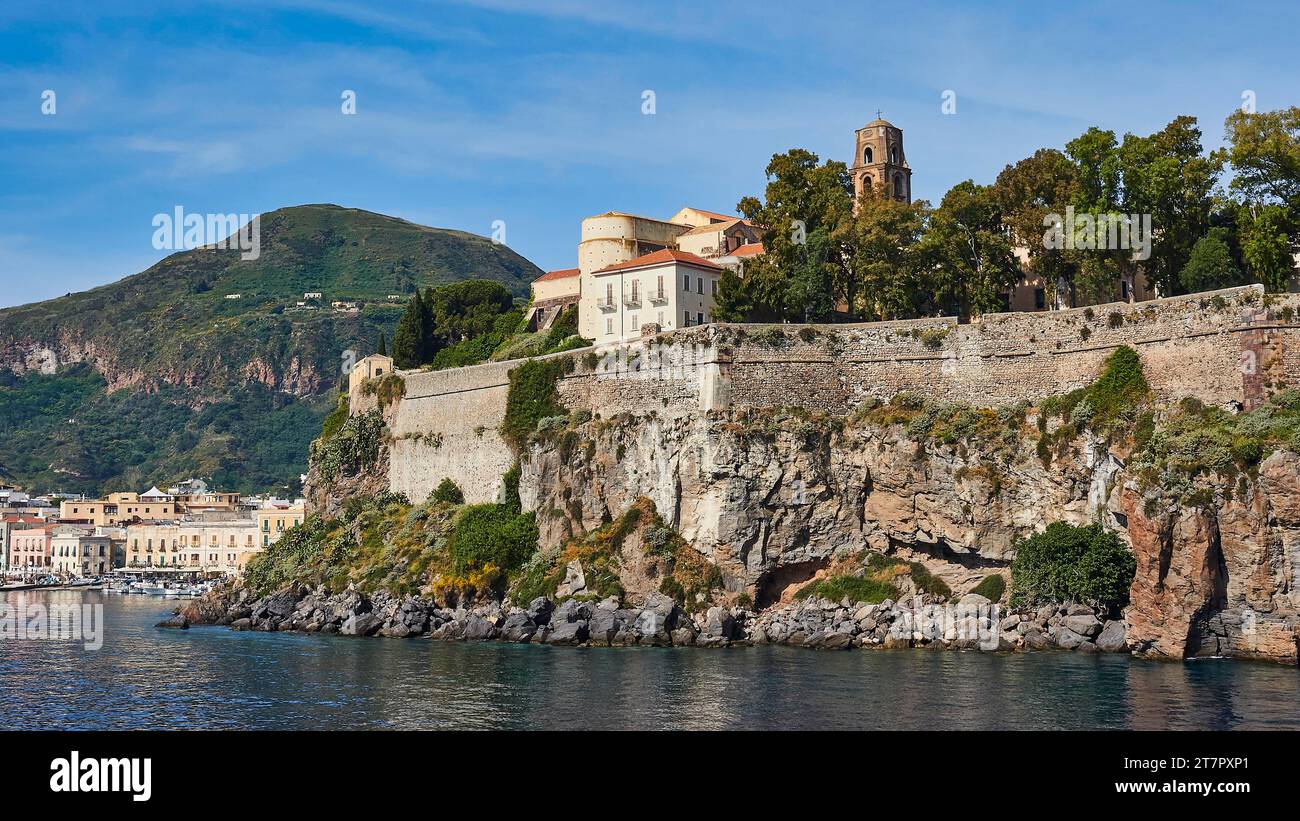 Castello di Lipari, Lipari town, from the sea, green mountain, houses ...