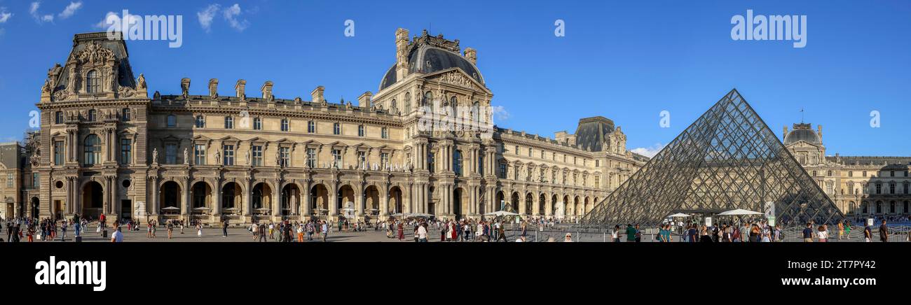 Panoramic photo of the Louvre Museum building and the glass pyramid ...